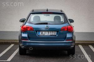 Blue Opel Astra 2013 in Riga, with an engine capacity of 2.00 L and mileage of 322 thousand km for 1650 €, photo 6 on AUTOMOTO.COM.LV