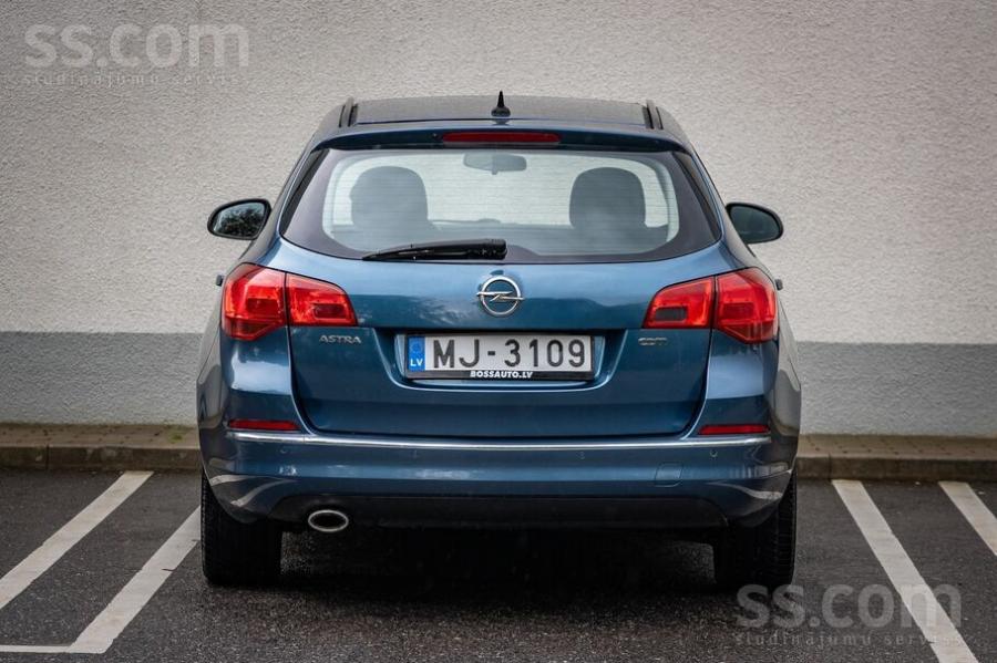 Blue Opel Astra 2013 in Riga, with an engine capacity of 2.00 L and mileage of 322 thousand km for 1650 €, photo 6 on AUTOMOTO.COM.LV
