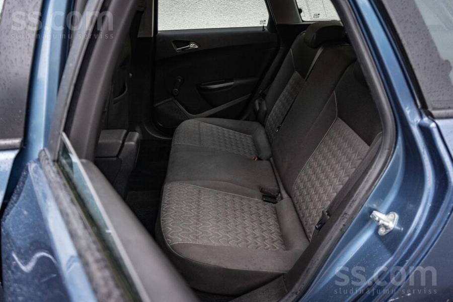 Blue Opel Astra 2013 in Riga, with an engine capacity of 2.00 L and mileage of 322 thousand km for 1650 €, photo 12 on AUTOMOTO.COM.LV