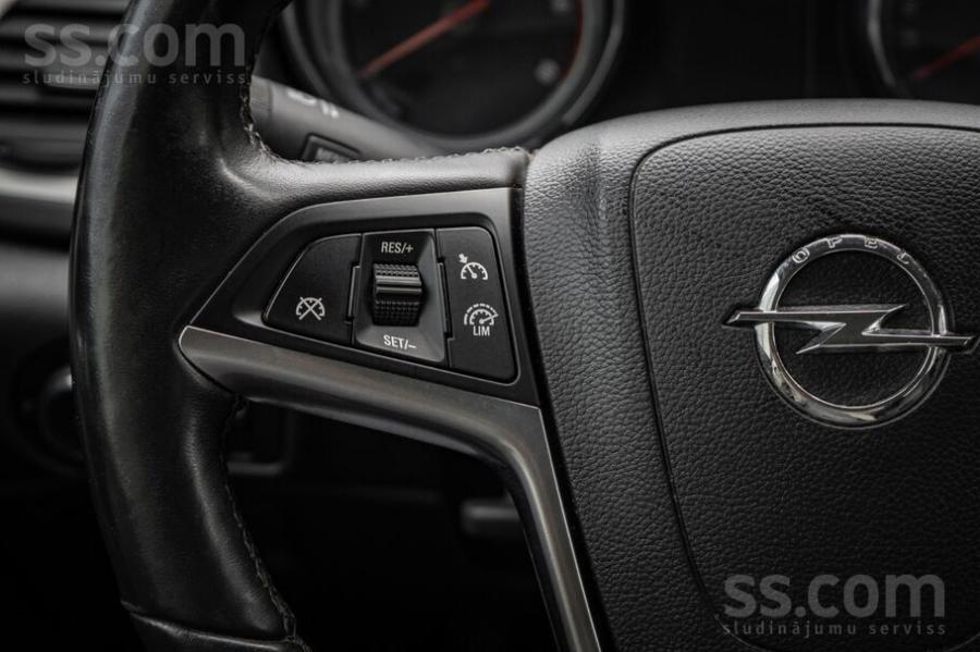 Blue Opel Astra 2013 in Riga, with an engine capacity of 2.00 L and mileage of 322 thousand km for 1650 €, photo 16 on AUTOMOTO.COM.LV