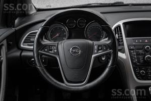 Blue Opel Astra 2013 in Riga, with an engine capacity of 2.00 L and mileage of 322 thousand km for 1650 €, photo 17 on AUTOMOTO.COM.LV