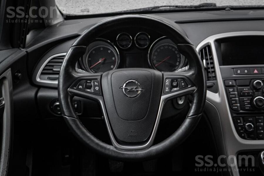 Blue Opel Astra 2013 in Riga, with an engine capacity of 2.00 L and mileage of 322 thousand km for 1650 €, photo 17 on AUTOMOTO.COM.LV