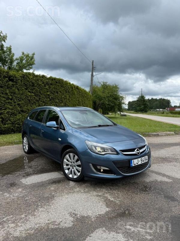 Zils Opel Astra 2014 Rīga, ar dzinēja tilpumu 2.00 L un nobraukumu 302 tūkst. km par 3900 €, foto 2 vietnē AUTOMOTO.COM.LV