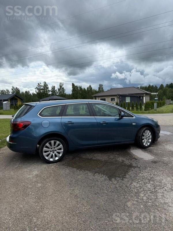 Zils Opel Astra 2014 Rīga, ar dzinēja tilpumu 2.00 L un nobraukumu 302 tūkst. km par 3900 €, foto 4 vietnē AUTOMOTO.COM.LV