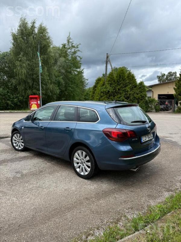 Zils Opel Astra 2014 Rīga, ar dzinēja tilpumu 2.00 L un nobraukumu 302 tūkst. km par 3900 €, foto 5 vietnē AUTOMOTO.COM.LV