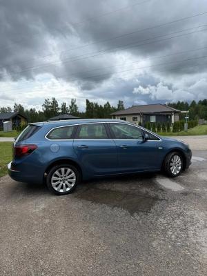 Zils Opel Astra 2014 Rīga, ar dzinēja tilpumu 2.00 L un nobraukumu 302 tūkst. km par 4300 €, foto 5 vietnē AUTOMOTO.COM.LV