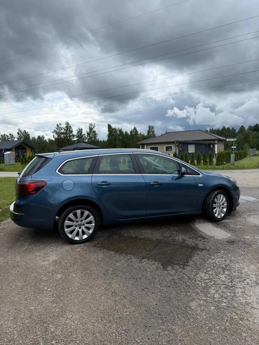 Zils Opel Astra 2014 Rīga, ar dzinēja tilpumu 2.00 L un nobraukumu 302 tūkst. km par 4300 €, foto 5 vietnē AUTOMOTO.COM.LV