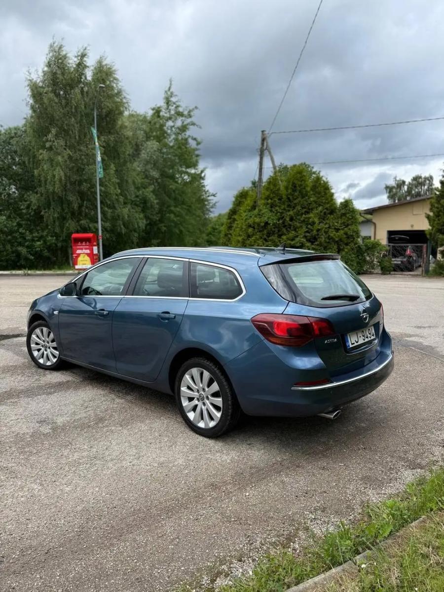Zils Opel Astra 2014 Rīga, ar dzinēja tilpumu 2.00 L un nobraukumu 302 tūkst. km par 4300 €, foto 6 vietnē AUTOMOTO.COM.LV