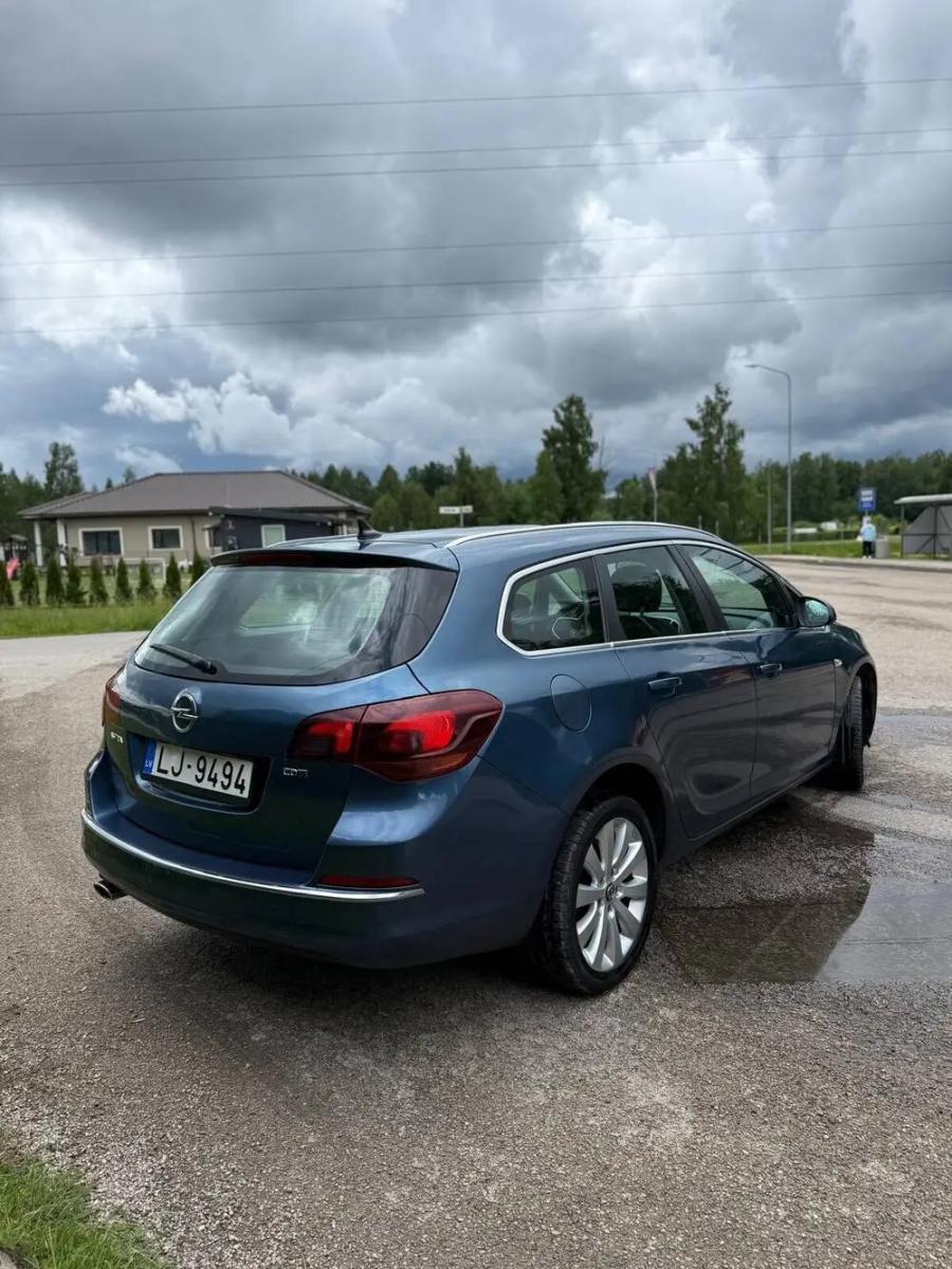Zils Opel Astra 2014 Rīga, ar dzinēja tilpumu 2.00 L un nobraukumu 302 tūkst. km par 4300 €, foto 7 vietnē AUTOMOTO.COM.LV
