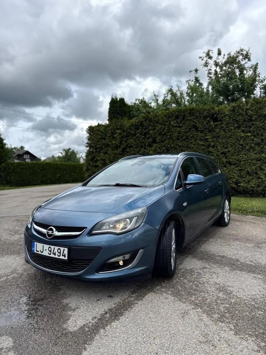 Zils Opel Astra 2014 Rīga, ar dzinēja tilpumu 2.00 L un nobraukumu 302 tūkst. km par 4300 €, foto 10 vietnē AUTOMOTO.COM.LV