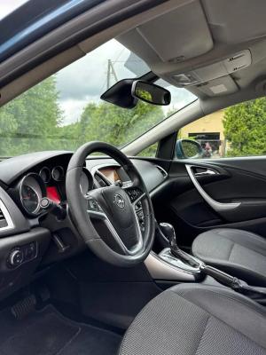 Zils Opel Astra 2014 Rīga, ar dzinēja tilpumu 2.00 L un nobraukumu 302 tūkst. km par 4300 €, foto 12 vietnē AUTOMOTO.COM.LV