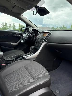 Zils Opel Astra 2014 Rīga, ar dzinēja tilpumu 2.00 L un nobraukumu 302 tūkst. km par 4300 €, foto 13 vietnē AUTOMOTO.COM.LV