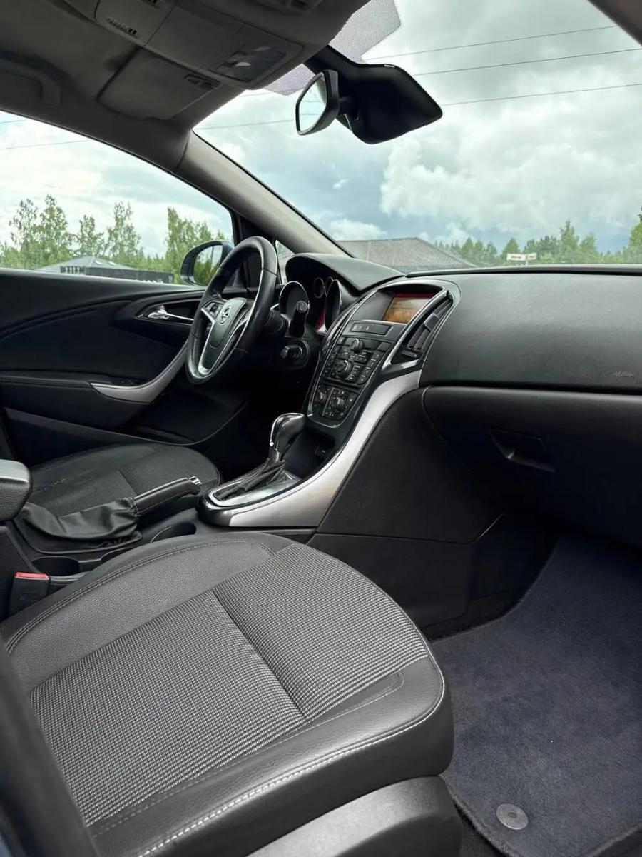 Zils Opel Astra 2014 Rīga, ar dzinēja tilpumu 2.00 L un nobraukumu 302 tūkst. km par 4300 €, foto 13 vietnē AUTOMOTO.COM.LV