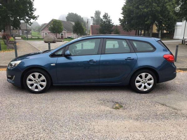 Blue Opel Astra 2014 in Raseiniai, with an engine capacity of 1.25 L and mileage of 290 thousand km for 4200 €, photo 7 on AUTOMOTO.COM.LV