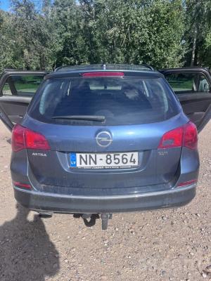 Blue Opel Astra 2014 in Riga, with an engine capacity of 2.00 L and mileage of 202 thousand km for 3600 €, photo 7 on AUTOMOTO.COM.LV