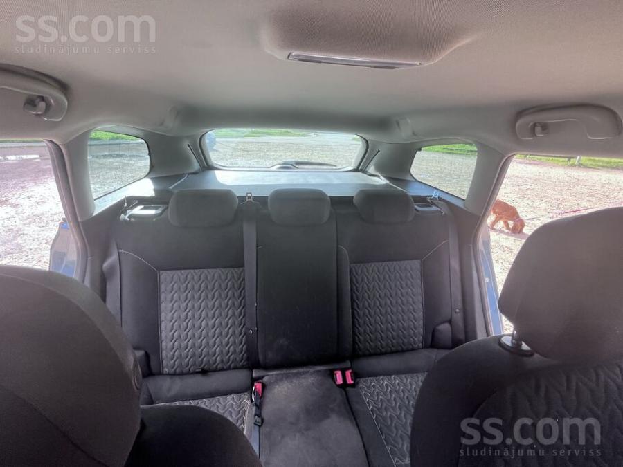 Blue Opel Astra 2014 in Riga, with an engine capacity of 2.00 L and mileage of 202 thousand km for 3600 €, photo 8 on AUTOMOTO.COM.LV