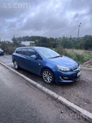 Blue Opel Astra 2014 in Riga, with an engine capacity of 2.00 L and mileage of 202 thousand km for 3600 €, photo 9 on AUTOMOTO.COM.LV