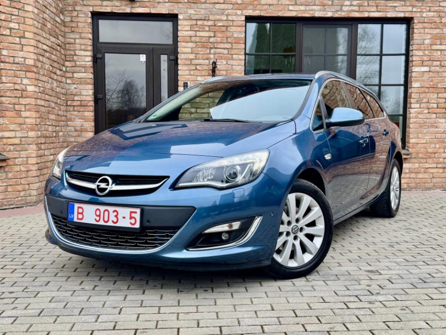 Blue Opel Astra 2016 in Riga, with an engine capacity of 1.60 L and mileage of 230 thousand km for 5300 €, photo 1 on AUTOMOTO.COM.LV