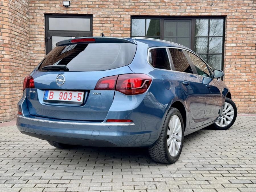 Blue Opel Astra 2016 in Riga, with an engine capacity of 1.60 L and mileage of 230 thousand km for 5300 €, photo 6 on AUTOMOTO.COM.LV