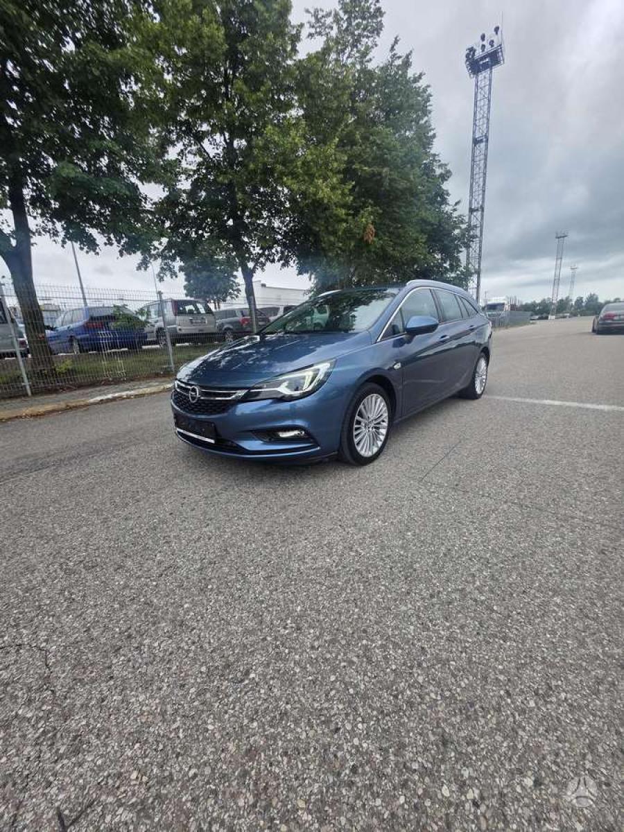 Blue Opel Astra 2016 in Marijampole, with an engine capacity of 1.60 L and mileage of 206 thousand km for 5450 €, photo 1 on AUTOMOTO.COM.LV