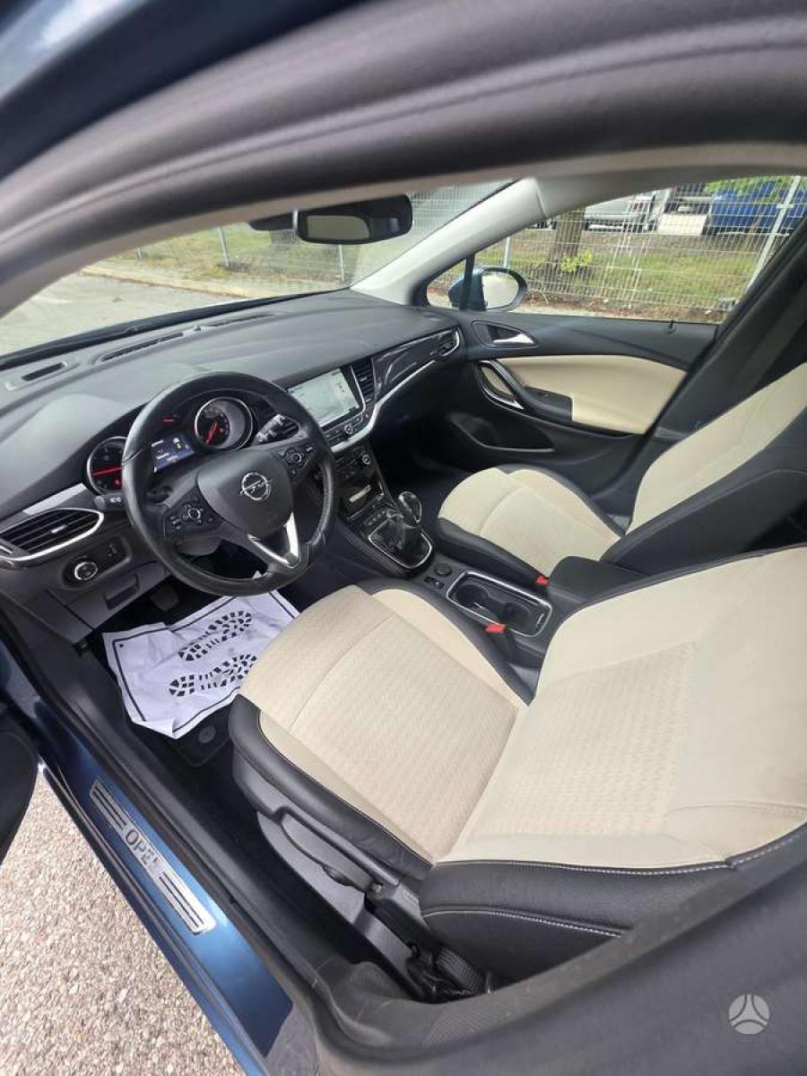 Blue Opel Astra 2016 in Marijampole, with an engine capacity of 1.60 L and mileage of 206 thousand km for 5450 €, photo 4 on AUTOMOTO.COM.LV