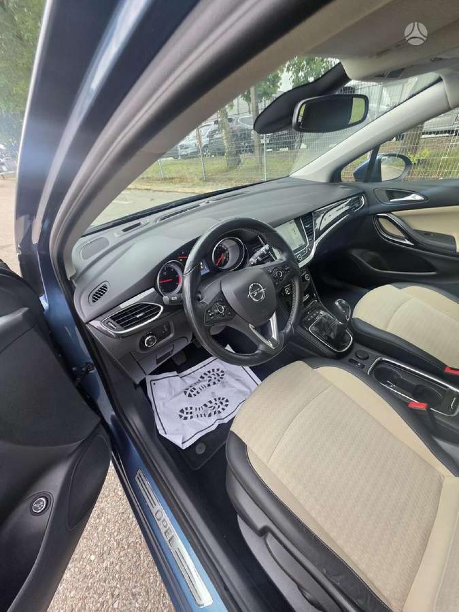 Blue Opel Astra 2016 in Marijampole, with an engine capacity of 1.60 L and mileage of 206 thousand km for 5450 €, photo 6 on AUTOMOTO.COM.LV