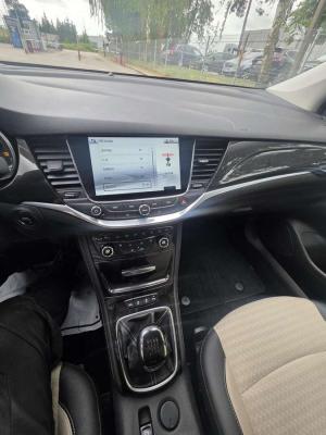 Blue Opel Astra 2016 in Marijampole, with an engine capacity of 1.60 L and mileage of 206 thousand km for 5450 €, photo 8 on AUTOMOTO.COM.LV
