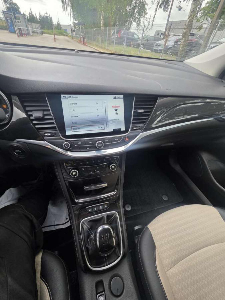 Blue Opel Astra 2016 in Marijampole, with an engine capacity of 1.60 L and mileage of 206 thousand km for 5450 €, photo 8 on AUTOMOTO.COM.LV