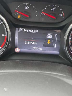 Blue Opel Astra 2016 in Marijampole, with an engine capacity of 1.60 L and mileage of 206 thousand km for 5450 €, photo 9 on AUTOMOTO.COM.LV