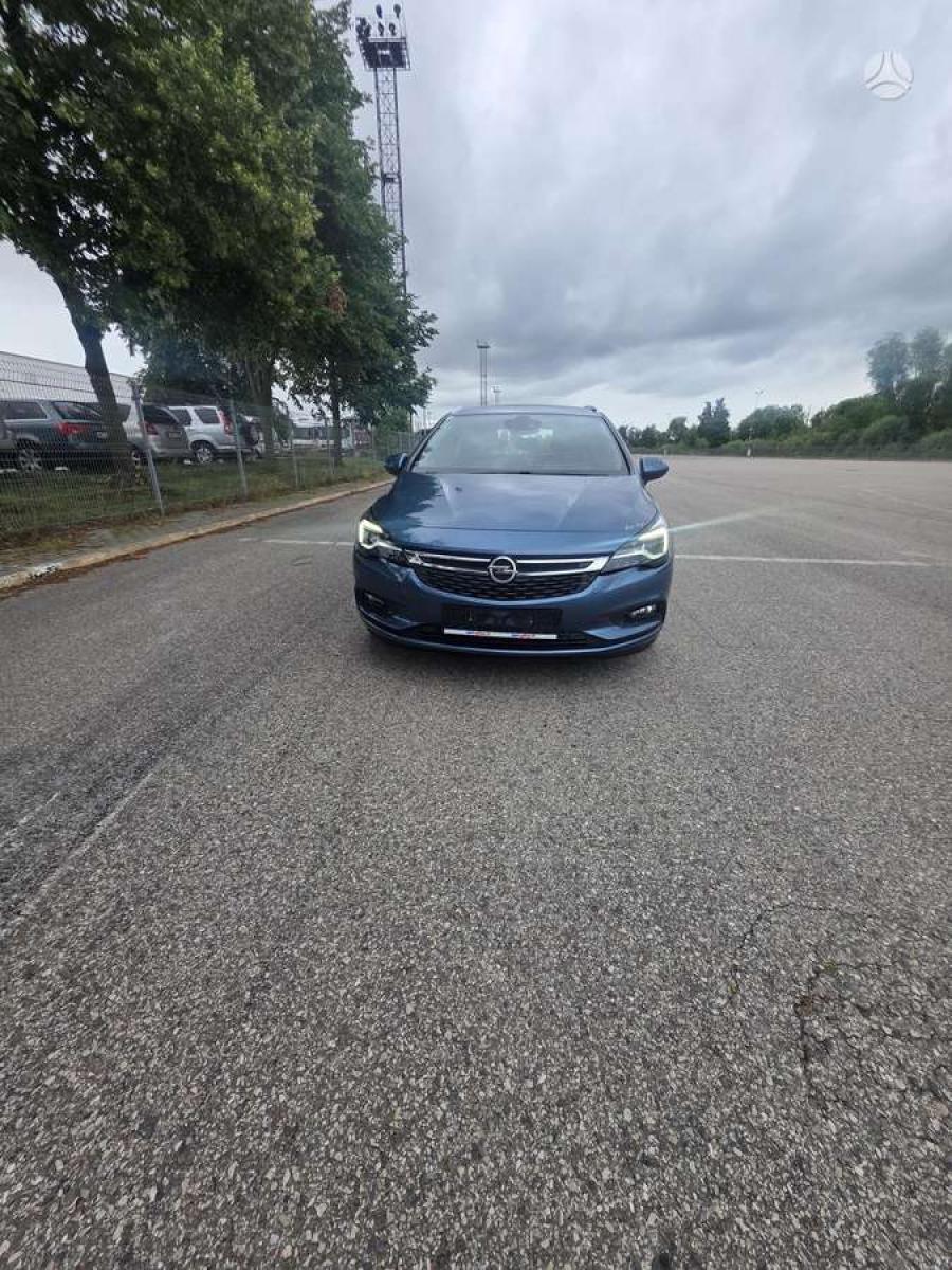 Blue Opel Astra 2016 in Marijampole, with an engine capacity of 1.60 L and mileage of 206 thousand km for 5450 €, photo 10 on AUTOMOTO.COM.LV