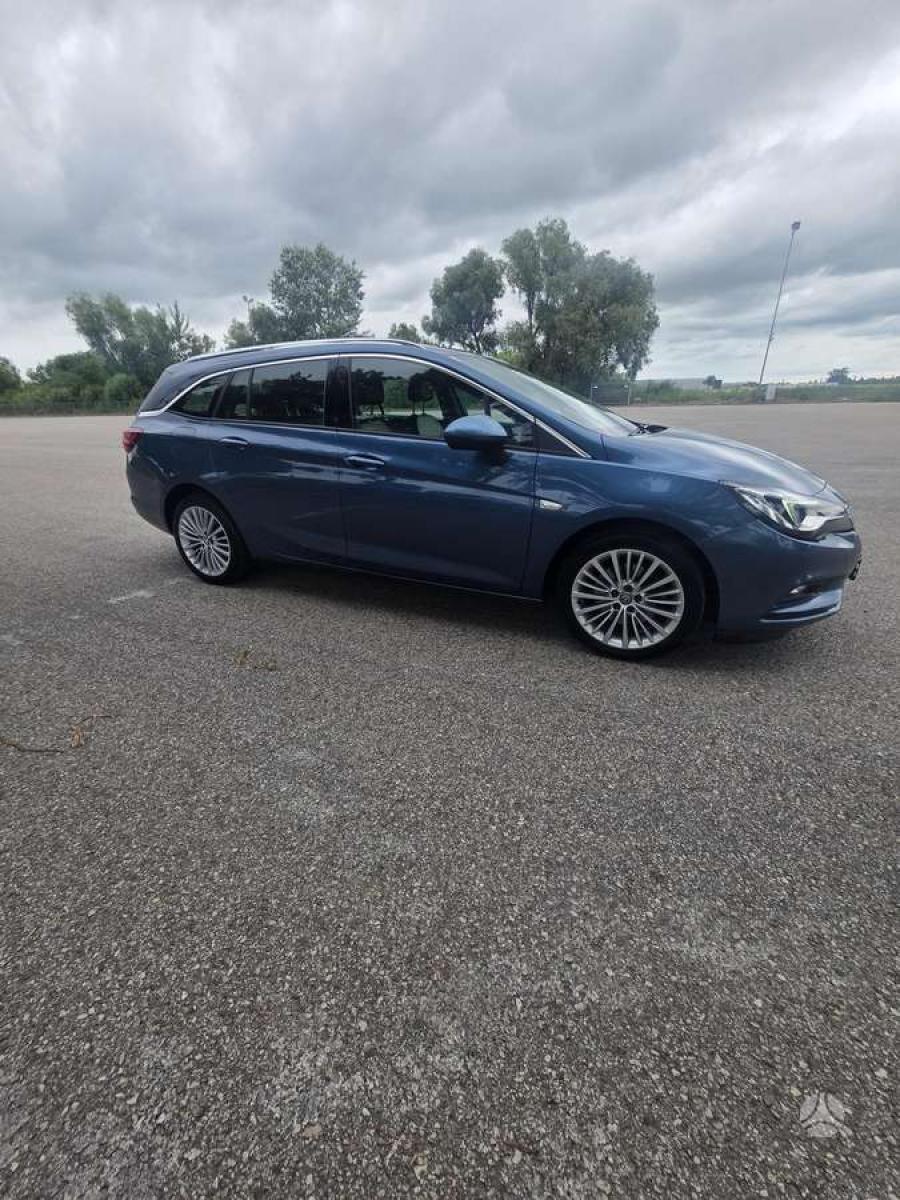 Blue Opel Astra 2016 in Marijampole, with an engine capacity of 1.60 L and mileage of 206 thousand km for 5450 €, photo 12 on AUTOMOTO.COM.LV