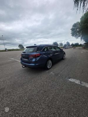 Blue Opel Astra 2016 in Marijampole, with an engine capacity of 1.60 L and mileage of 206 thousand km for 5450 €, photo 13 on AUTOMOTO.COM.LV
