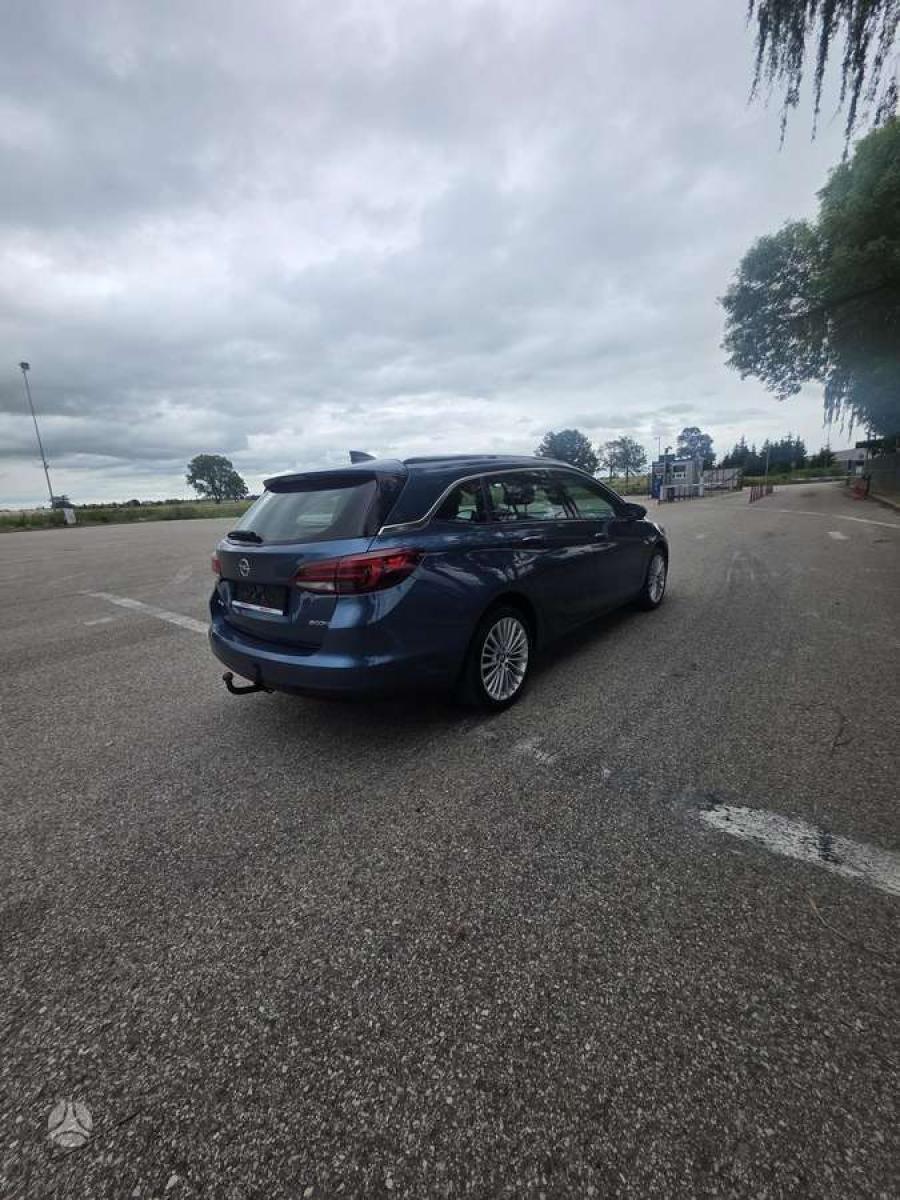Blue Opel Astra 2016 in Marijampole, with an engine capacity of 1.60 L and mileage of 206 thousand km for 5450 €, photo 13 on AUTOMOTO.COM.LV