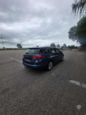 Blue Opel Astra 2016 in Marijampole, with an engine capacity of 1.60 L and mileage of 206 thousand km for 5450 €, photo 14 on AUTOMOTO.COM.LV