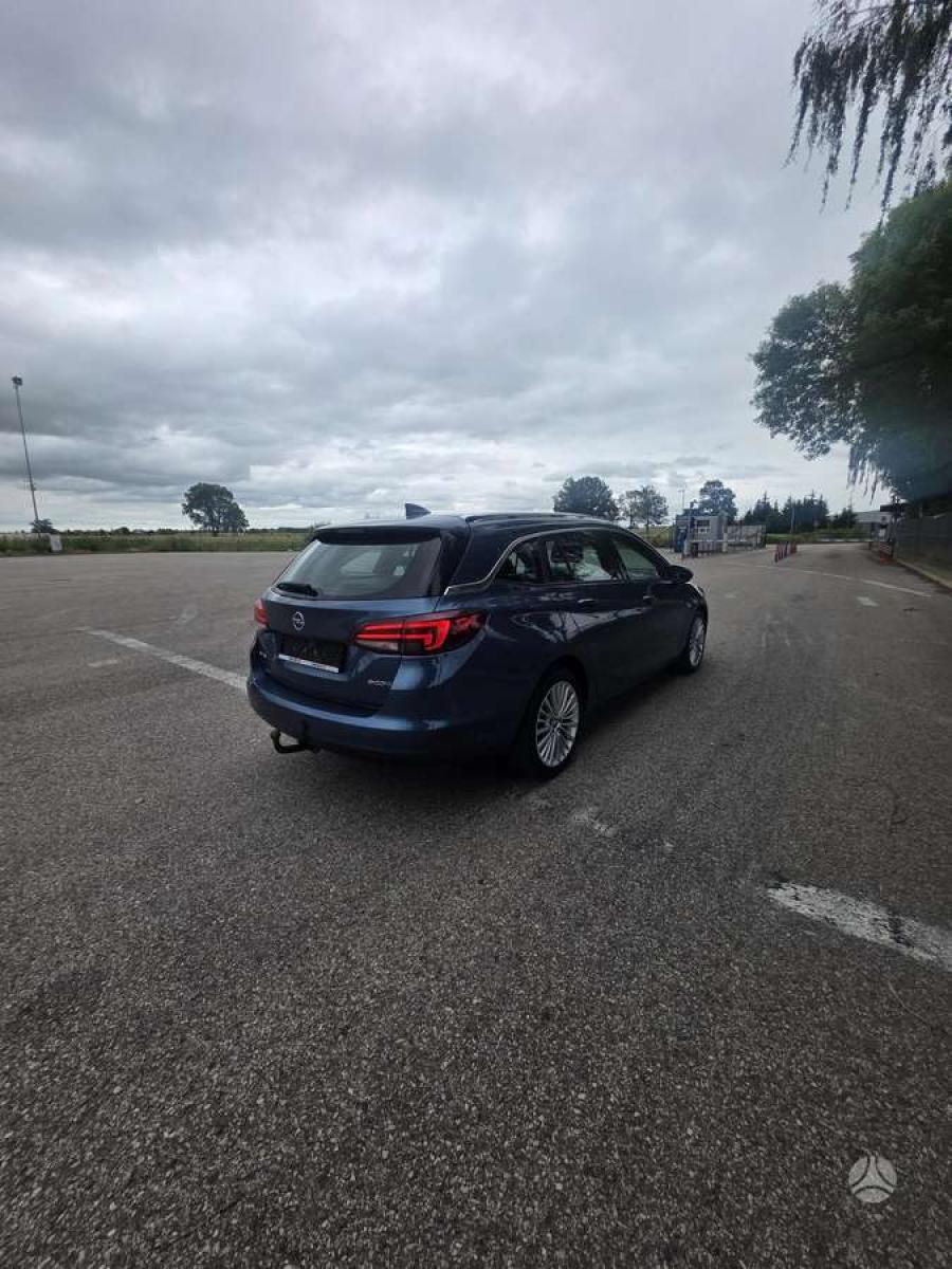 Blue Opel Astra 2016 in Marijampole, with an engine capacity of 1.60 L and mileage of 206 thousand km for 5450 €, photo 14 on AUTOMOTO.COM.LV