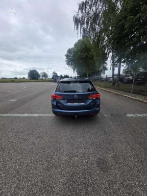 Blue Opel Astra 2016 in Marijampole, with an engine capacity of 1.60 L and mileage of 206 thousand km for 5450 €, photo 15 on AUTOMOTO.COM.LV
