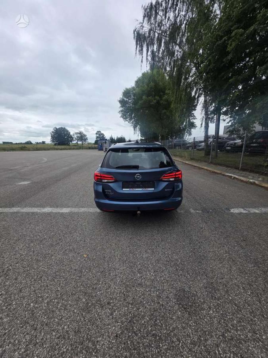 Blue Opel Astra 2016 in Marijampole, with an engine capacity of 1.60 L and mileage of 206 thousand km for 5450 €, photo 15 on AUTOMOTO.COM.LV