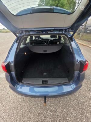 Blue Opel Astra 2016 in Marijampole, with an engine capacity of 1.60 L and mileage of 206 thousand km for 5450 €, photo 19 on AUTOMOTO.COM.LV