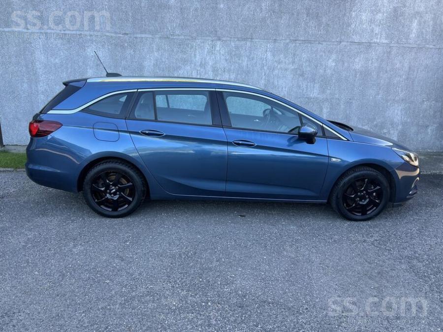 Blue Opel Astra 2016 in Liepaja, with an engine capacity of 1.60 L and mileage of 255 thousand km for 6150 €, photo 3 on AUTOMOTO.COM.LV