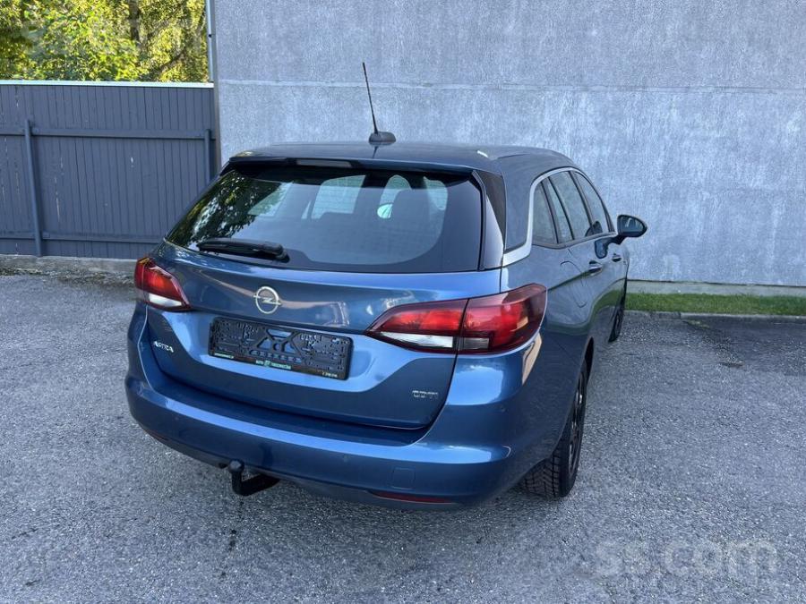Blue Opel Astra 2016 in Liepaja, with an engine capacity of 1.60 L and mileage of 255 thousand km for 6150 €, photo 4 on AUTOMOTO.COM.LV