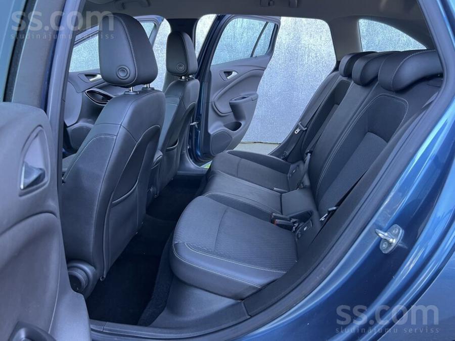 Blue Opel Astra 2016 in Liepaja, with an engine capacity of 1.60 L and mileage of 255 thousand km for 6150 €, photo 12 on AUTOMOTO.COM.LV