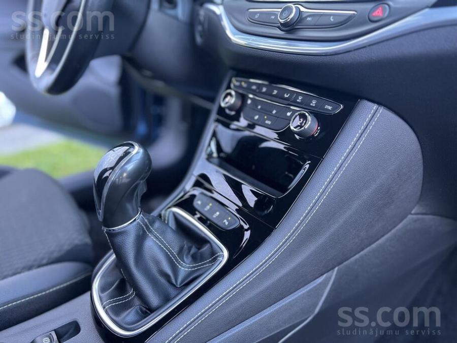 Blue Opel Astra 2016 in Liepaja, with an engine capacity of 1.60 L and mileage of 255 thousand km for 6150 €, photo 14 on AUTOMOTO.COM.LV