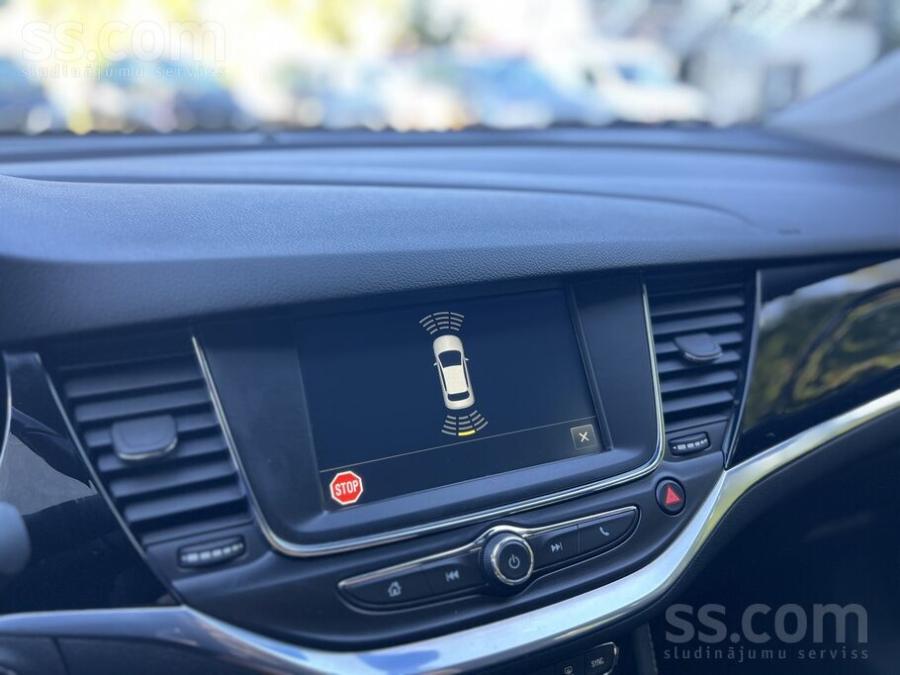 Blue Opel Astra 2016 in Liepaja, with an engine capacity of 1.60 L and mileage of 255 thousand km for 6150 €, photo 16 on AUTOMOTO.COM.LV