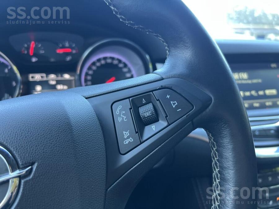 Blue Opel Astra 2016 in Liepaja, with an engine capacity of 1.60 L and mileage of 255 thousand km for 6150 €, photo 18 on AUTOMOTO.COM.LV