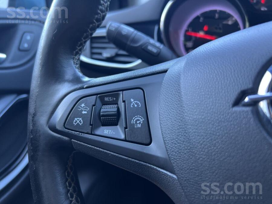 Blue Opel Astra 2016 in Liepaja, with an engine capacity of 1.60 L and mileage of 255 thousand km for 6150 €, photo 19 on AUTOMOTO.COM.LV