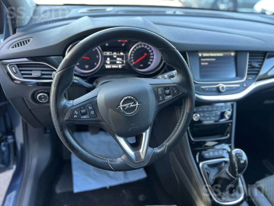 Blue Opel Astra 2016 in Liepaja, with an engine capacity of 1.60 L and mileage of 255 thousand km for 6150 €, photo 33 on AUTOMOTO.COM.LV