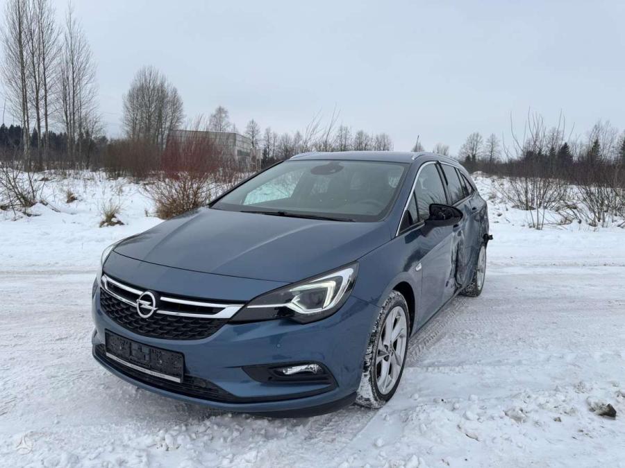 Blue Opel Astra 2017 in Panevezys, with an engine capacity of 1.60 L and mileage of 71 thousand km for 5350 €, photo 1 on AUTOMOTO.COM.LV