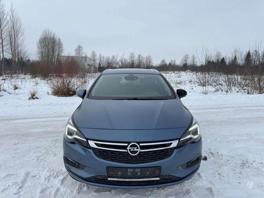 Blue Opel Astra 2017 in Panevezys, with an engine capacity of 1.60 L and mileage of 71 thousand km for 5350 €, photo 2 on AUTOMOTO.COM.LV