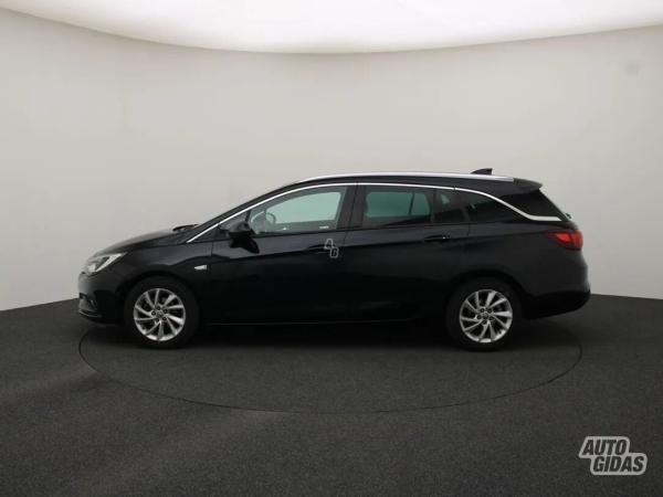 Blue Opel Astra 2017 in Vilnius, with an engine capacity of 1.40 L and mileage of 167 thousand km for 9399 €, photo 6 on AUTOMOTO.COM.LV