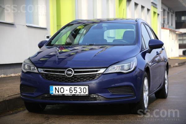 Blue Opel Astra 2017 in Riga, with an engine capacity of 1.60 L and mileage of 259 thousand km for 5795 €, photo 1 on AUTOMOTO.COM.LV